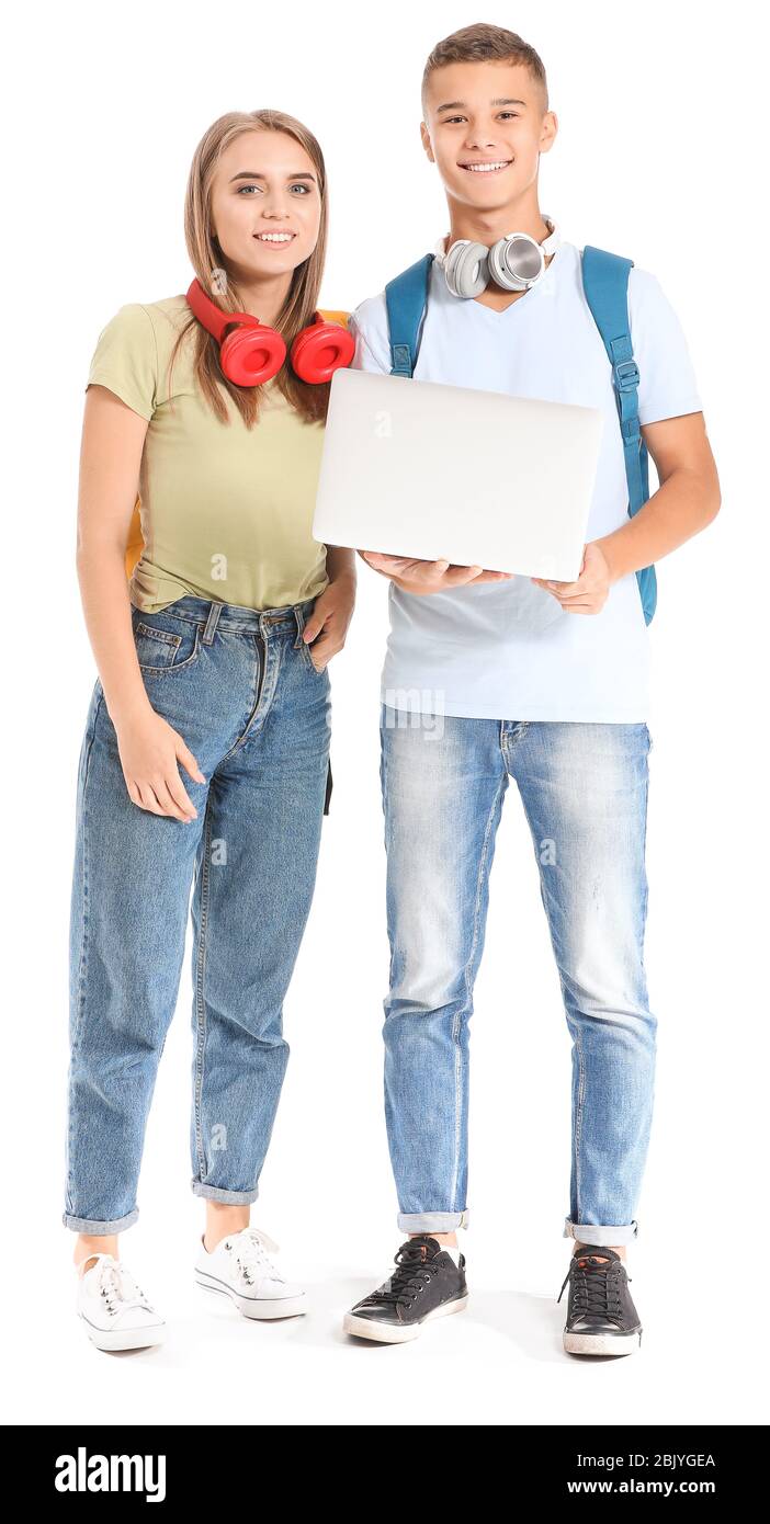 Portrait of young students with laptop on white background Stock Photo ...