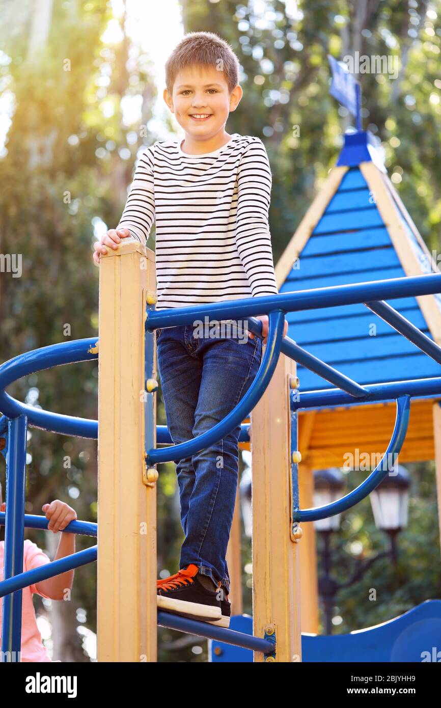 Cute little boy on playground Stock Photo - Alamy