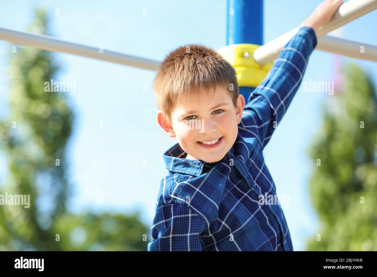Cute little boy on playground Stock Photo - Alamy