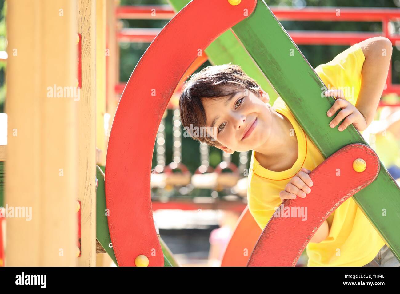 Cute little boy on playground Stock Photo - Alamy