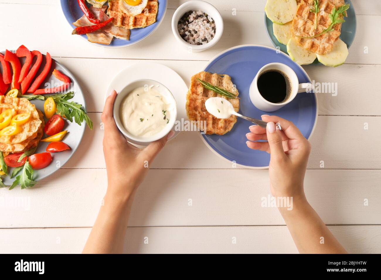 Girl eating waffles hi-res stock photography and images - Alamy