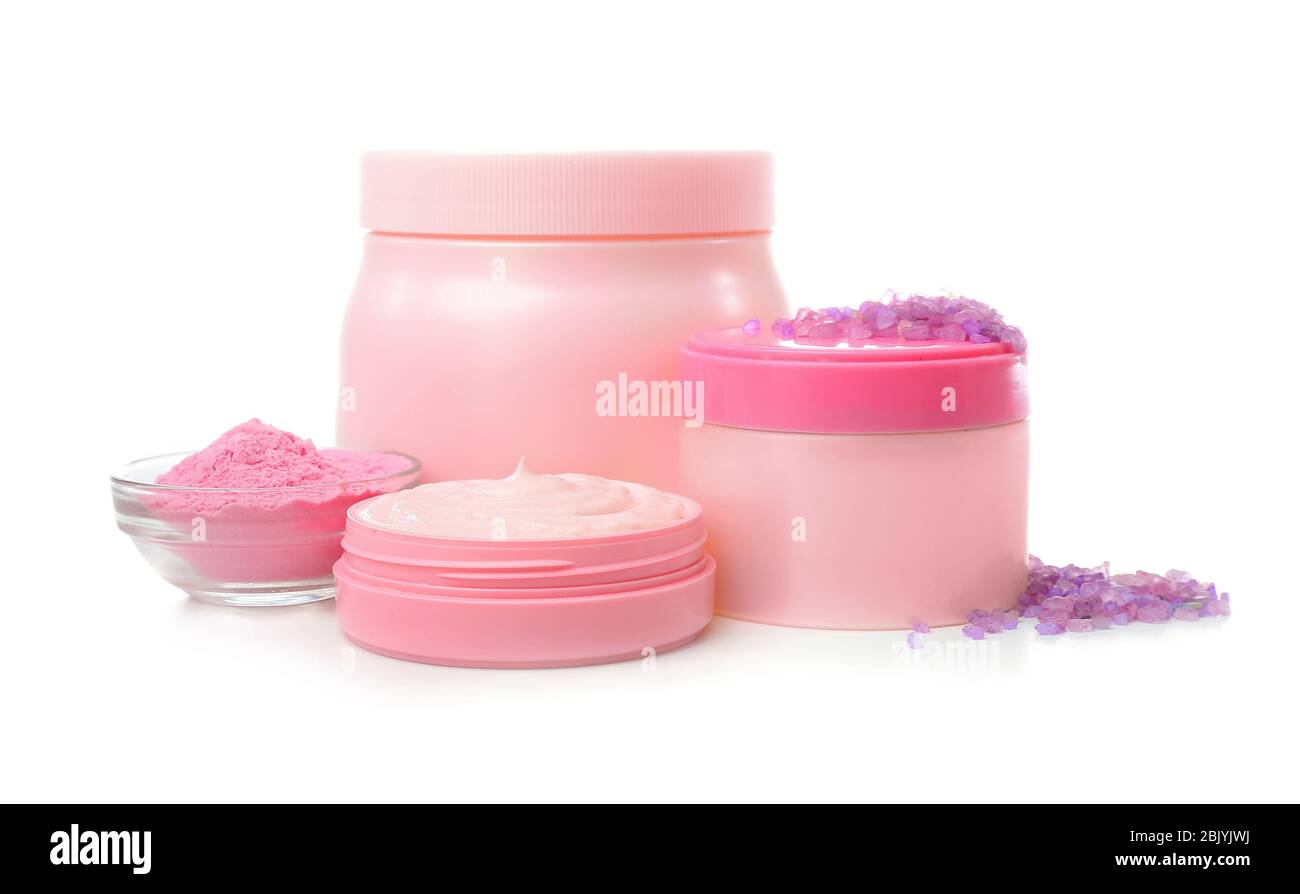 Different body cream on white background Stock Photo - Alamy