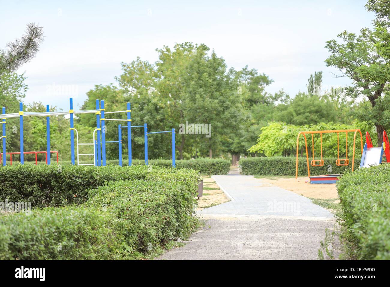 Modern playground in city park Stock Photo - Alamy