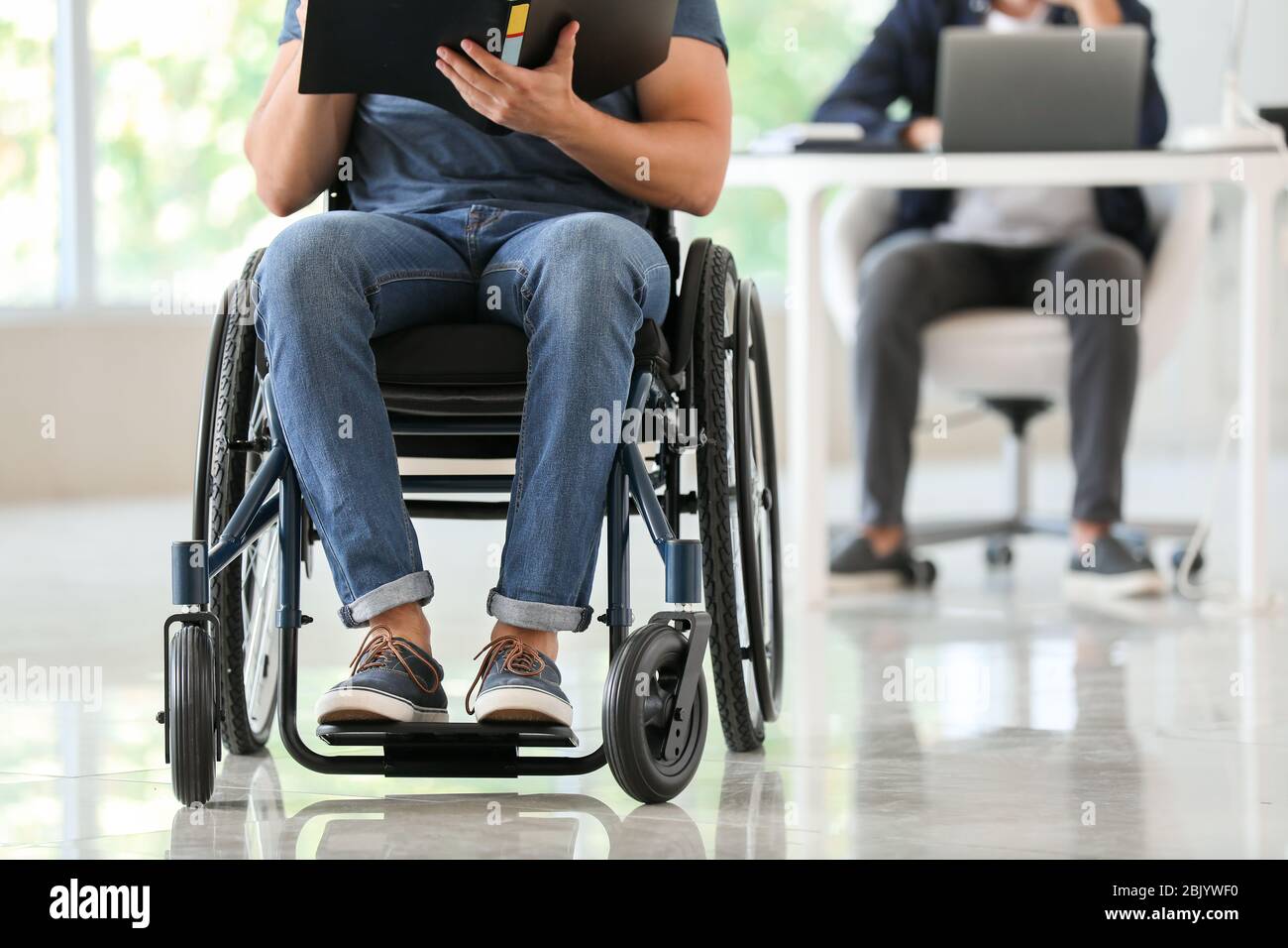 Paralyzed invalid handicapped businessman hi-res stock photography and ...