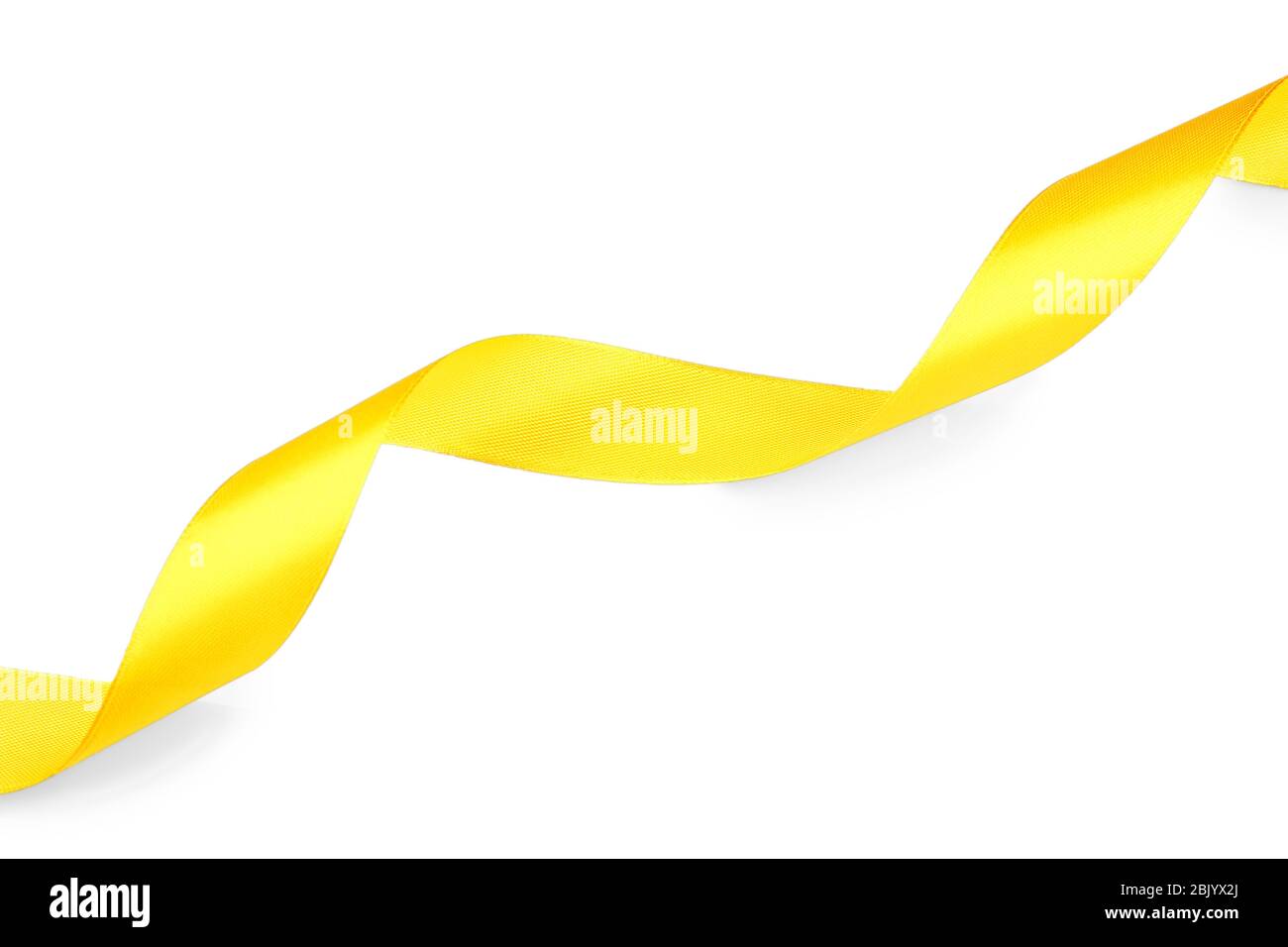 Yellow satin ribbon on white background Stock Photo - Alamy