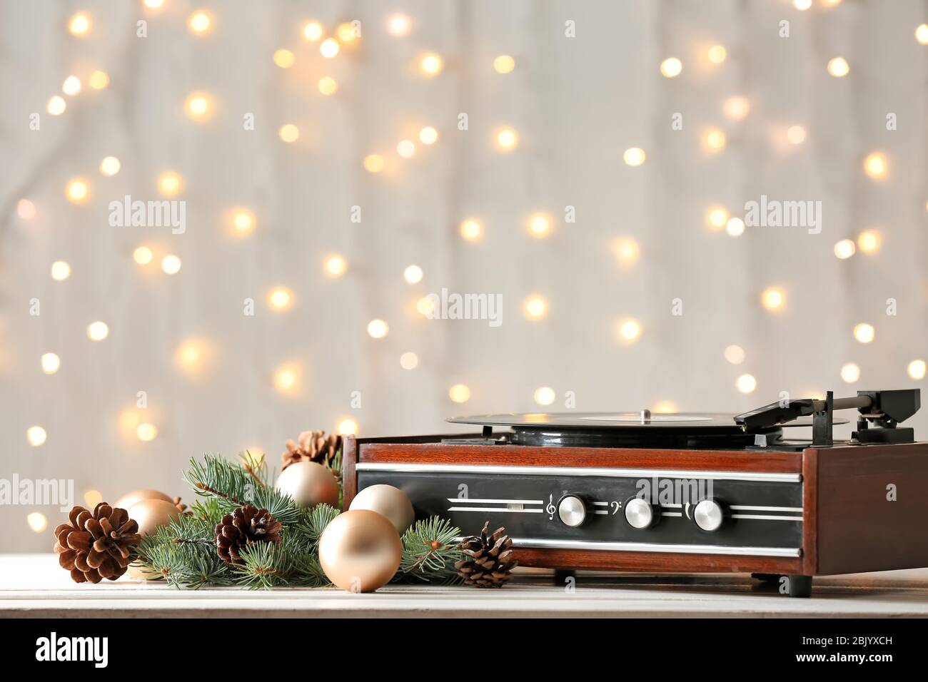 Record player and Christmas decor on table Stock Photo - Alamy