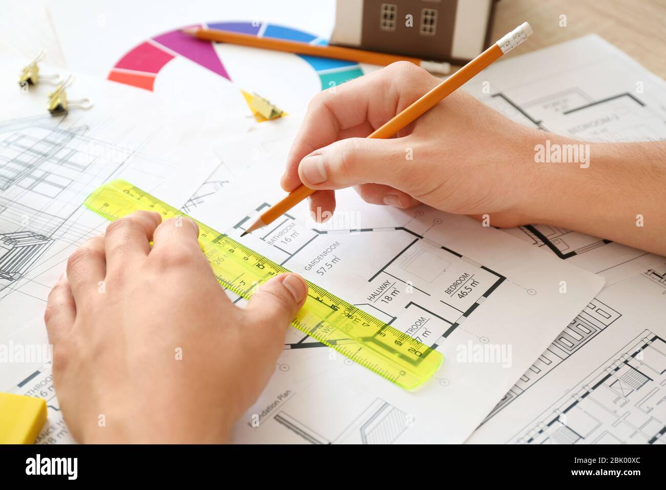 Architect working on project of building in office, closeup Stock Photo ...