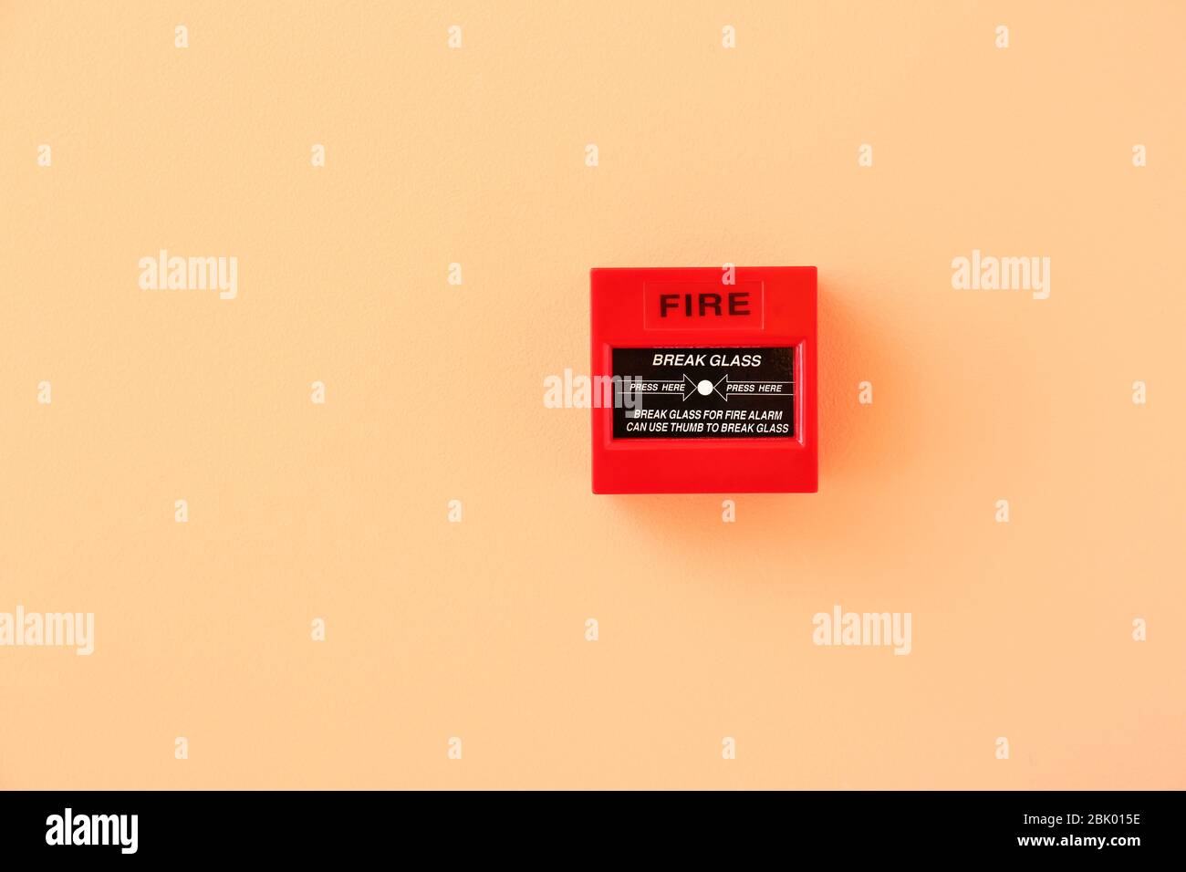 Modern manual call point of fire alarm system on color wall Stock Photo ...