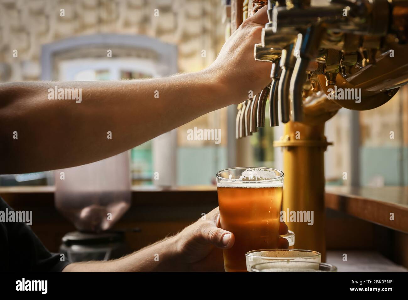 Pouring fresh beer in glass hi-res stock photography and images - Alamy