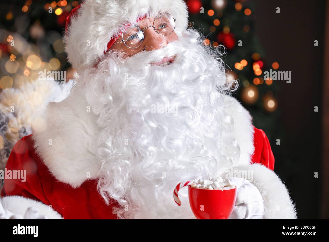 Santa Claus drinking hot chocolate on Christmas eve Stock Photo - Alamy