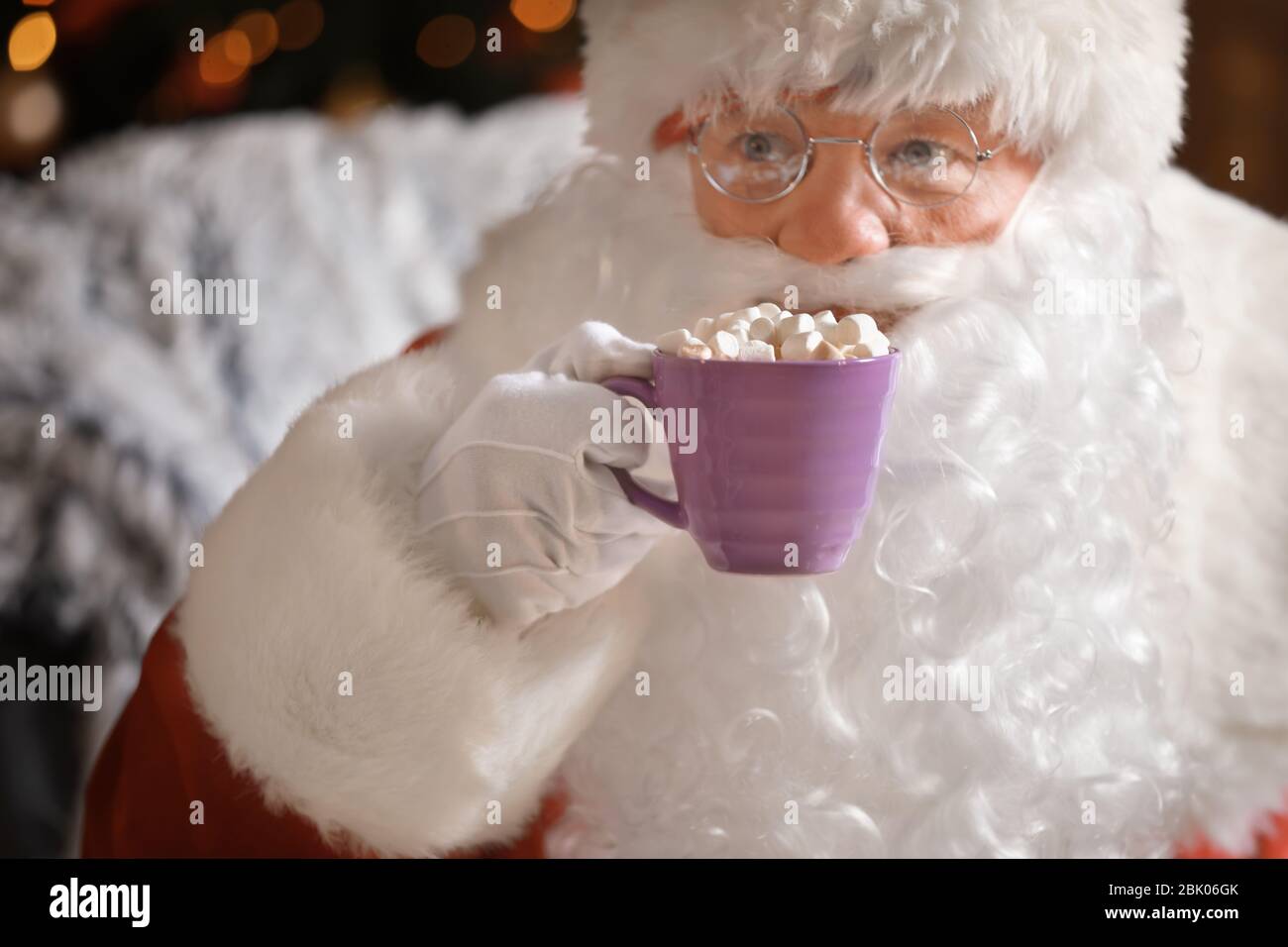 Santa Claus drinking hot chocolate on Christmas eve Stock Photo - Alamy