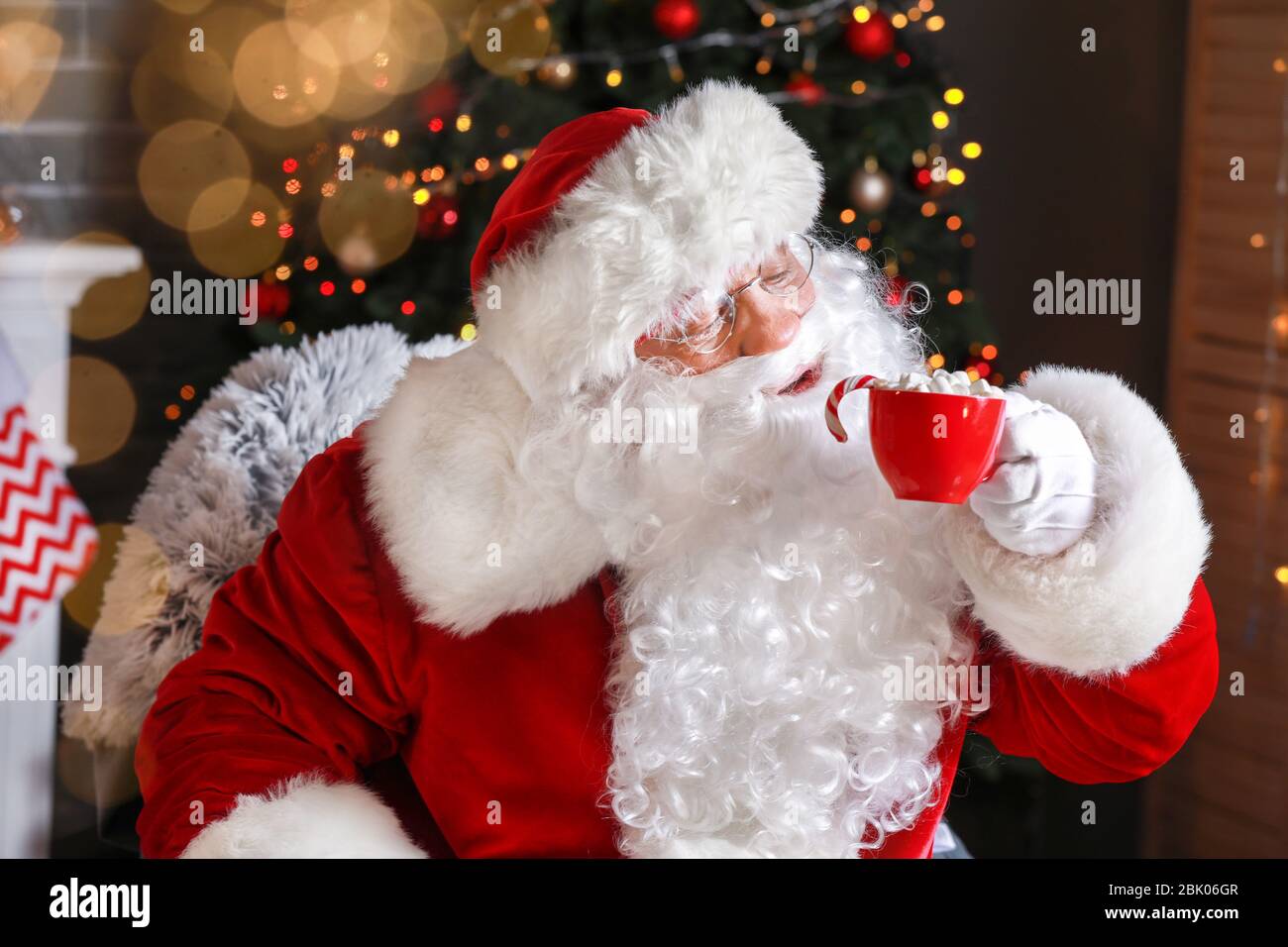 Santa Claus drinking hot chocolate on Christmas eve Stock Photo - Alamy