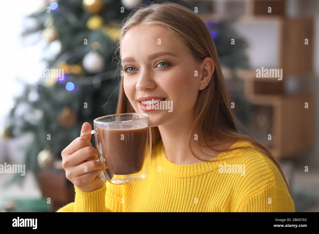 Woman drinking hot chocolate hi-res stock photography and images - Alamy