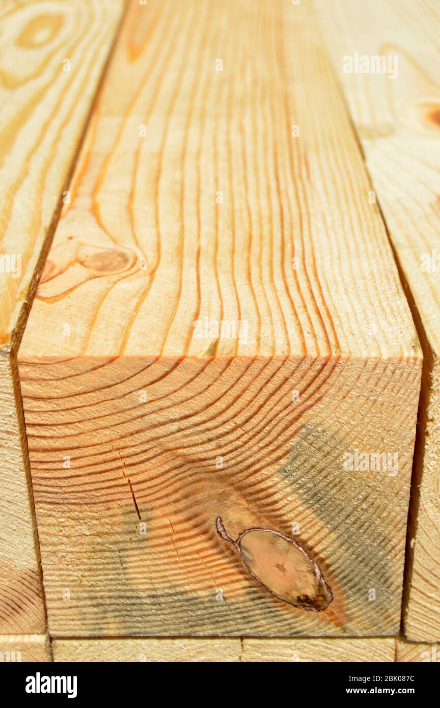 Pine lumber stacked in a row at the sawmill, lumber stack for storage ...