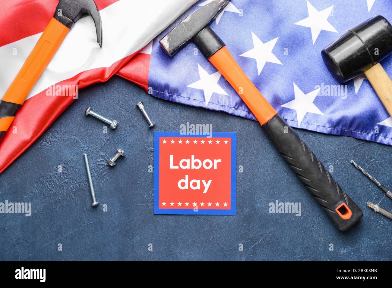 Set of tools, card with text LABOR DAY and USA flag on color background ...