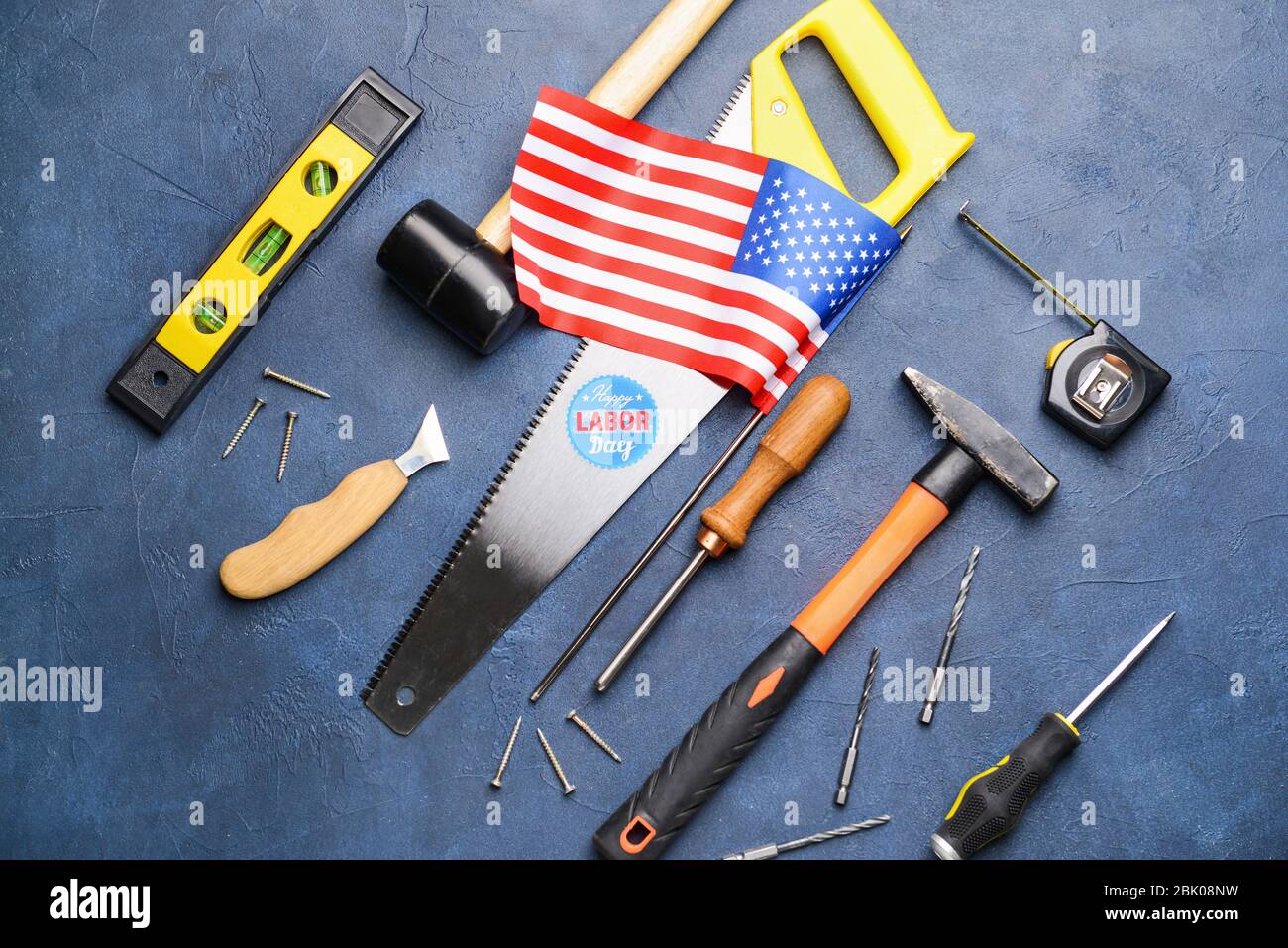 Set of tools, USA flag and card with text HAPPY LABOR DAY on color ...
