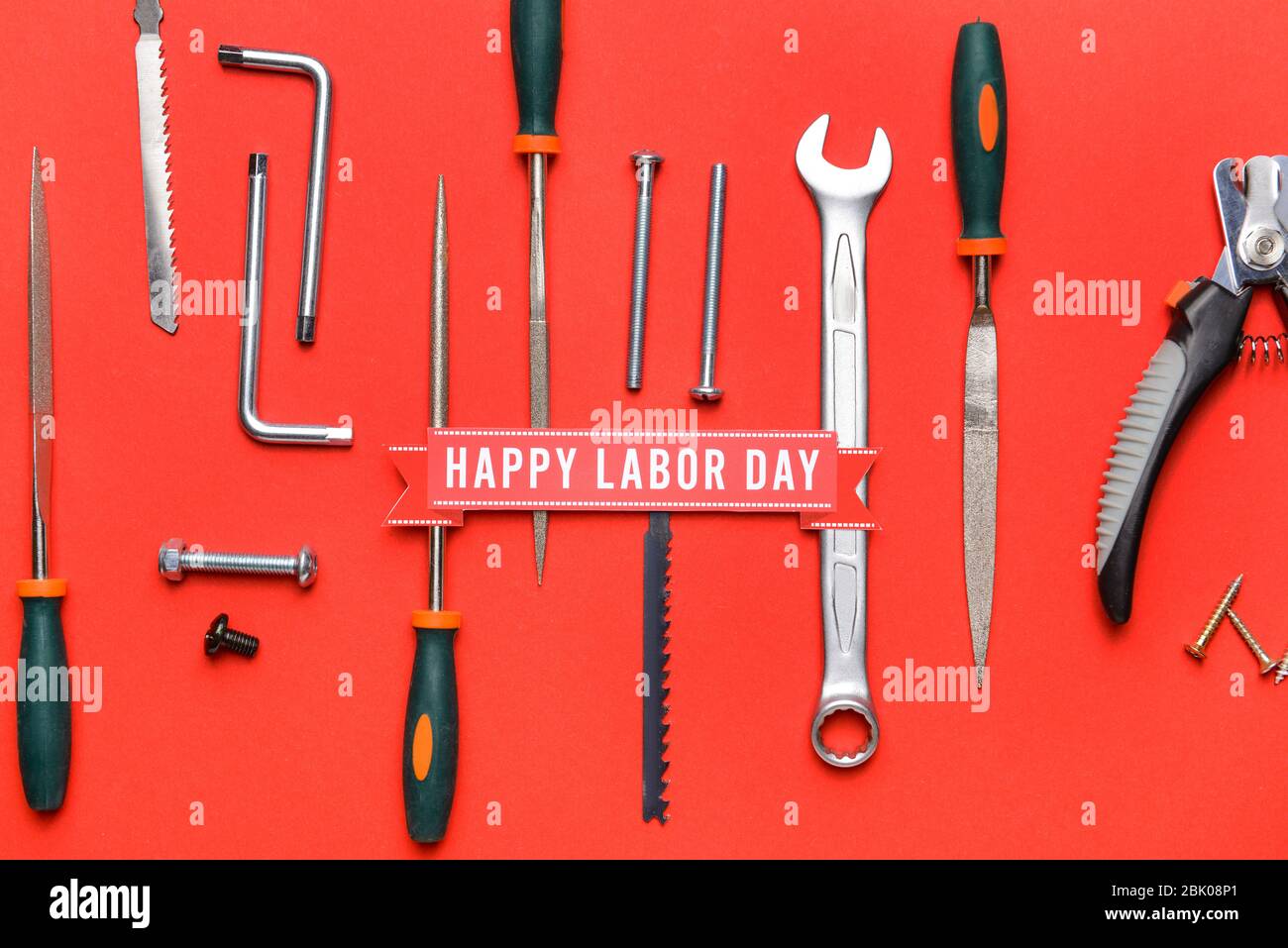 Set of tools and text HAPPY LABOR DAY on color background Stock Photo ...