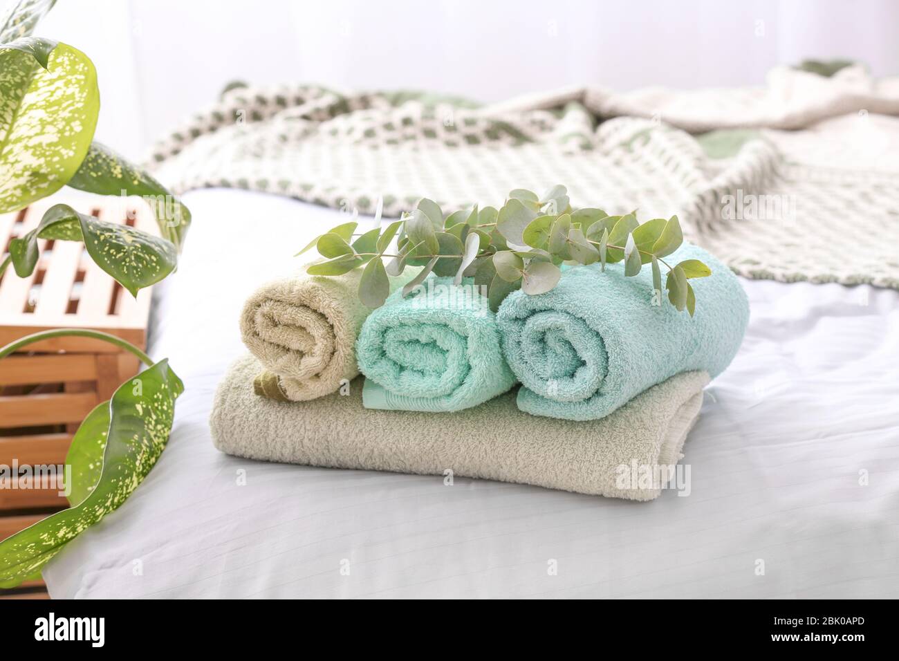 Clean soft towels on bed Stock Photo - Alamy