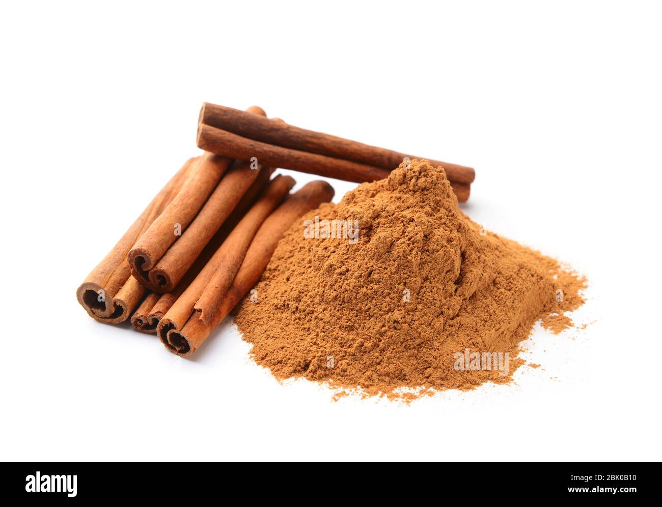 Aromatic cinnamon sticks and powder on white background Stock Photo - Alamy
