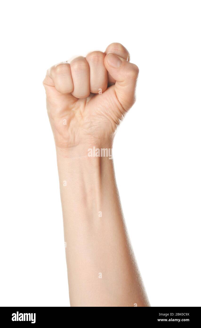 Clenched female hand on white background Stock Photo - Alamy