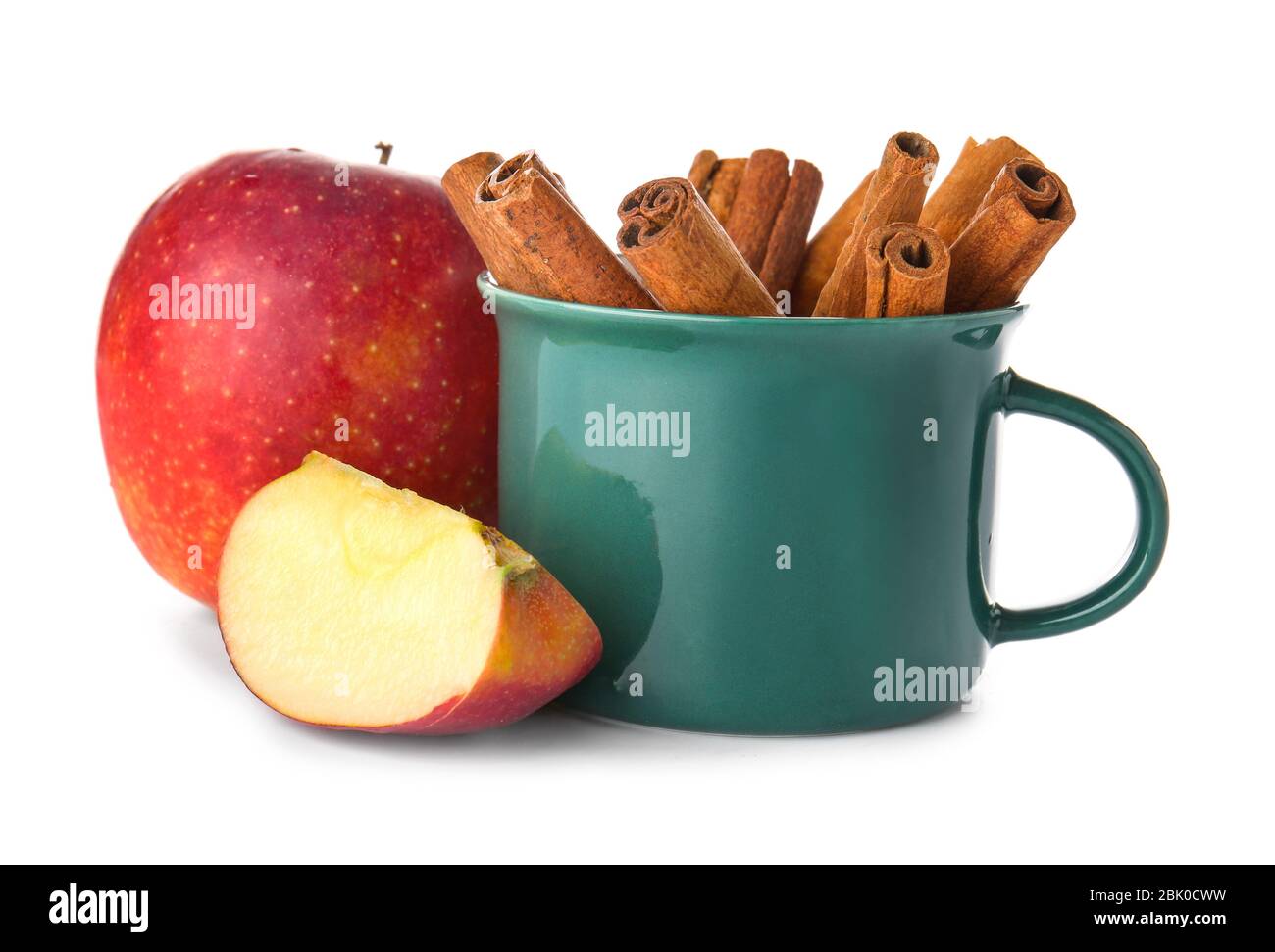Fresh apple with cinnamon on white background Stock Photo - Alamy