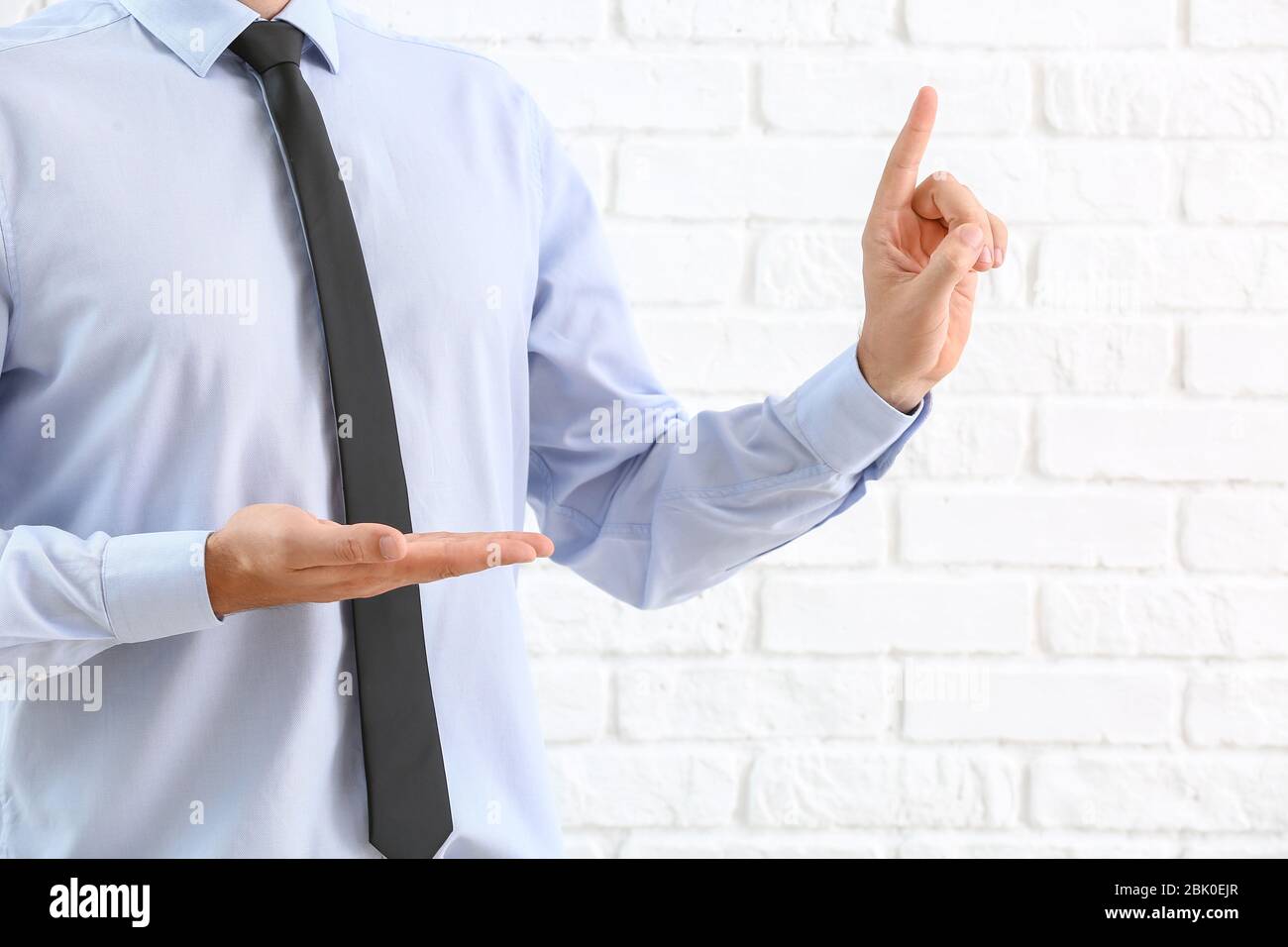 Businessman using virtual screen on white background Stock Photo - Alamy Businessman using virtual screen on white background Stock Photo - Alamy