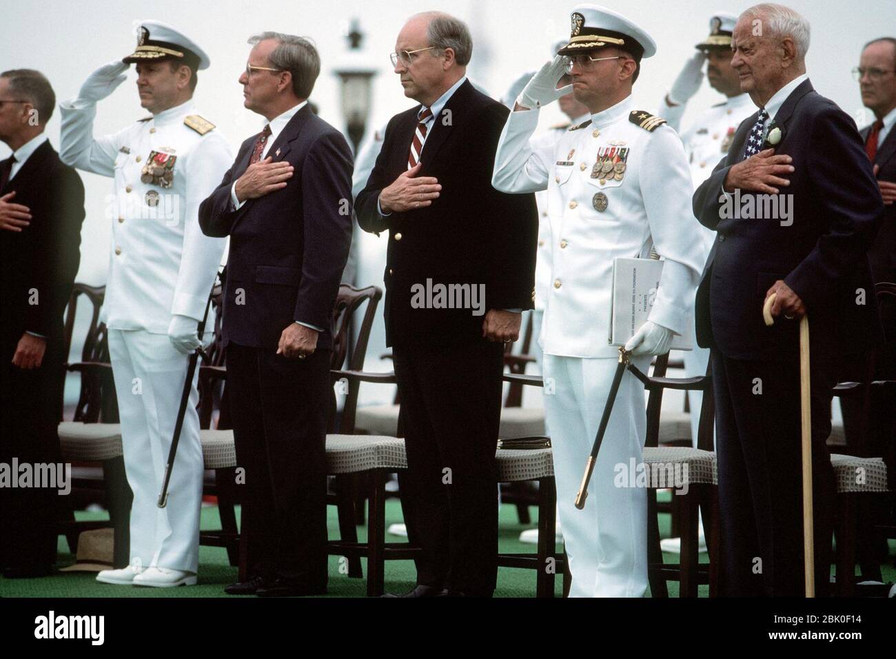 Honoring the flag during the commissioning ceremony for the guided ...