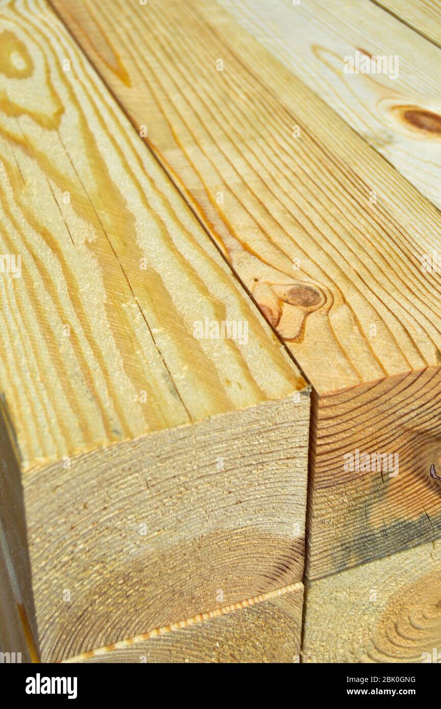 Pine lumber stacked in a row at the sawmill, lumber stack for storage ...