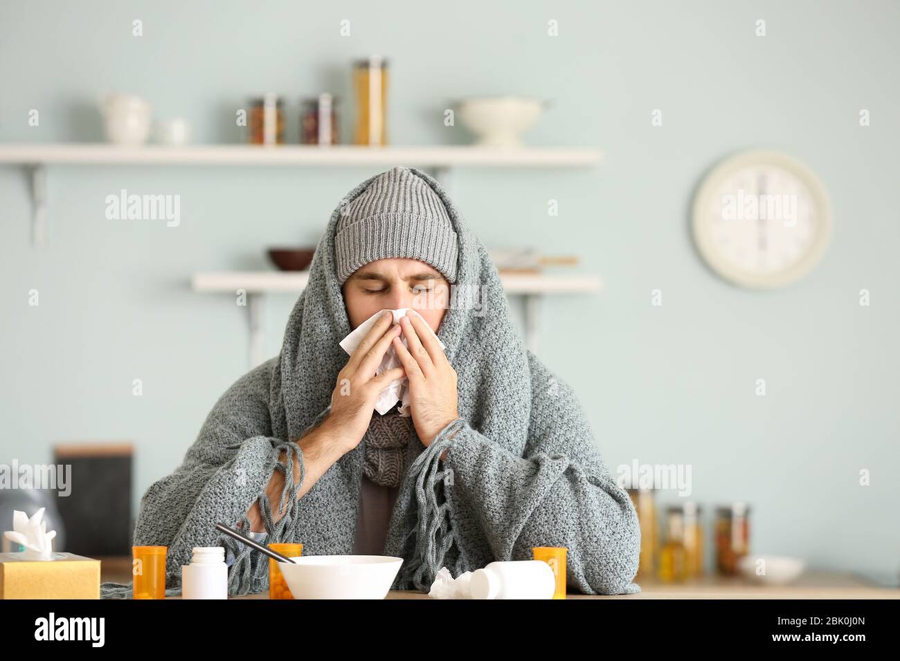 Sick man with chicken soup hi-res stock photography and images - Alamy