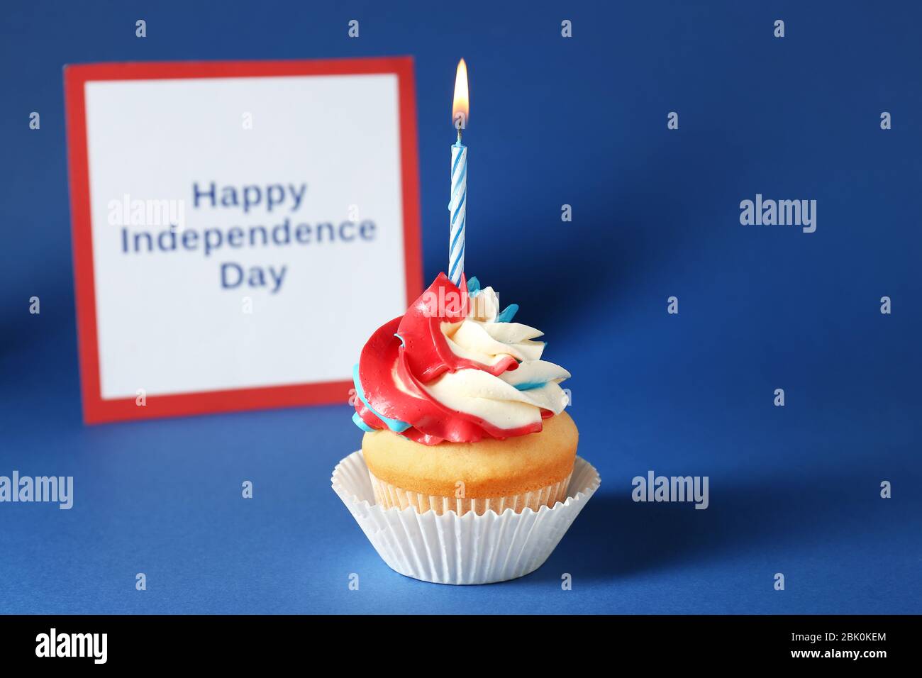 Tasty patriotic cupcake and card with text HAPPY INDEPENDENCE DAY on ...