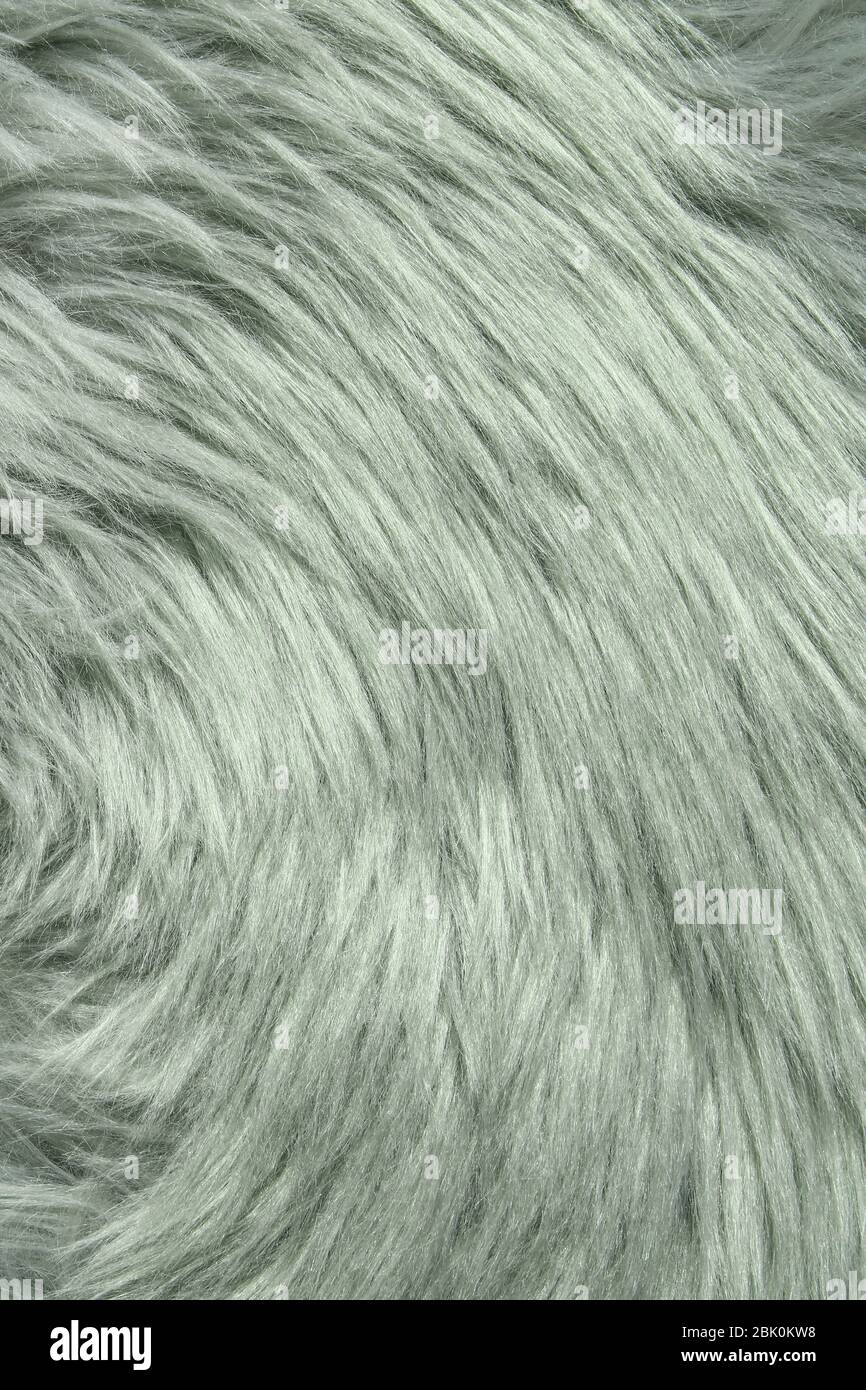 Grey furry material as background Stock Photo - Alamy