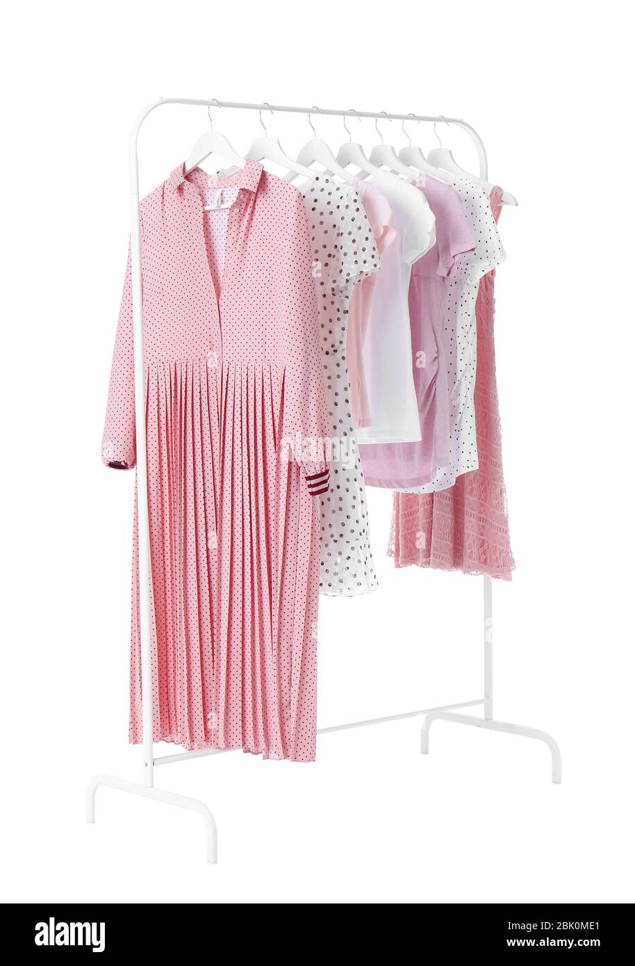 Rack with hanging clothes on white background Stock Photo - Alamy