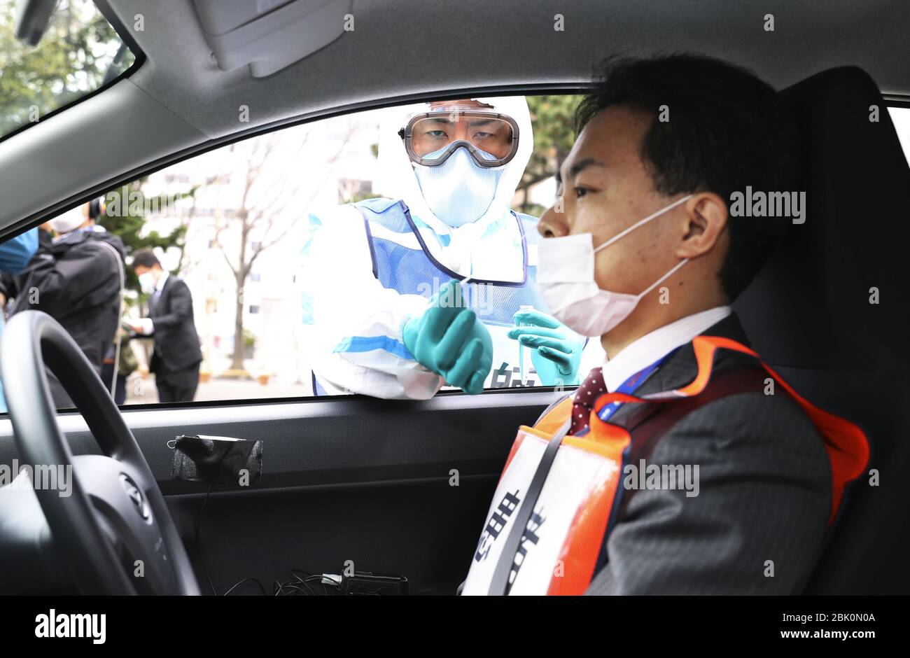 Training for drive-through coronavirus testing is under way in Sapporo ...