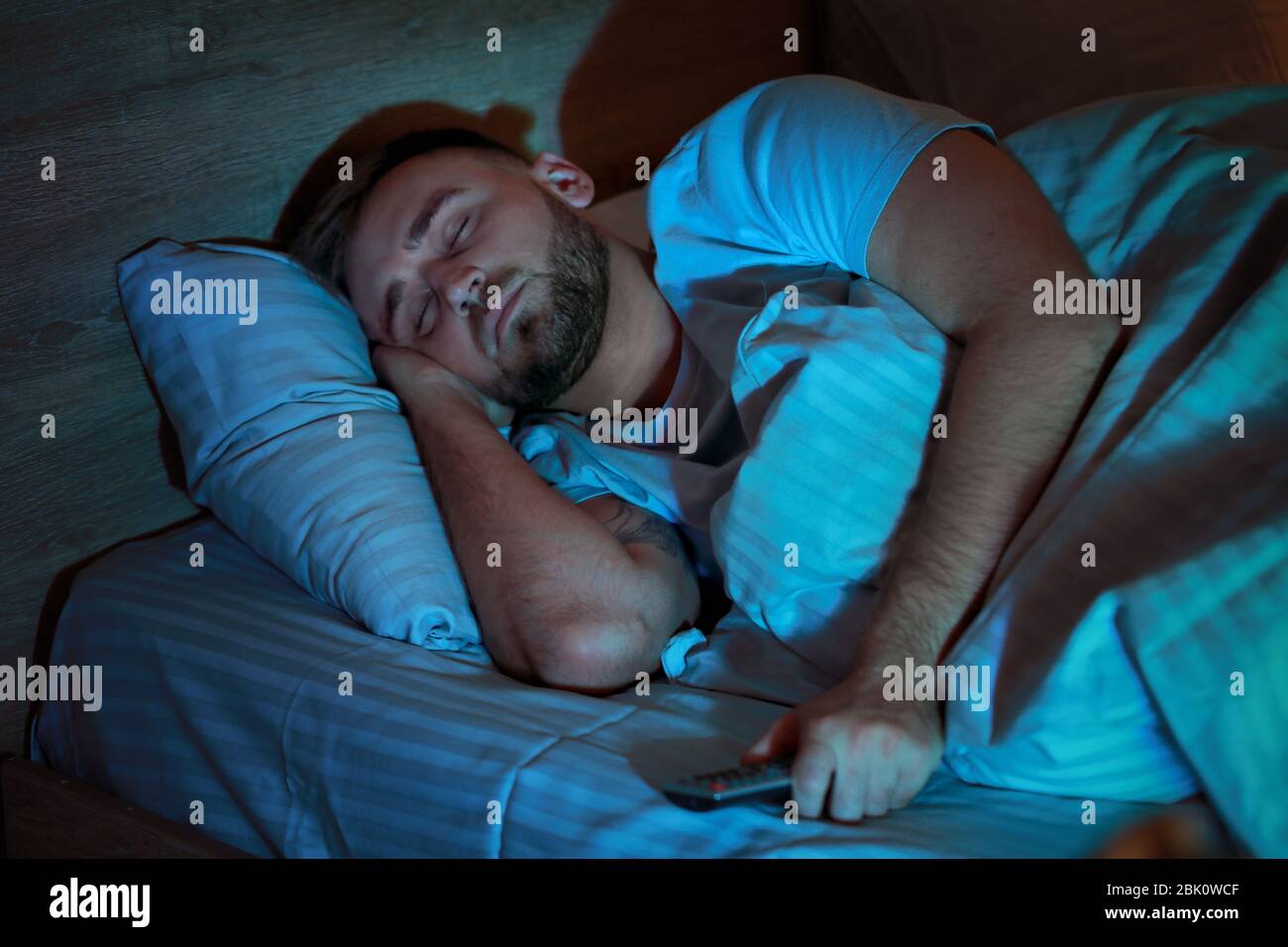 Remote control man sleep hi-res stock photography and images - Alamy