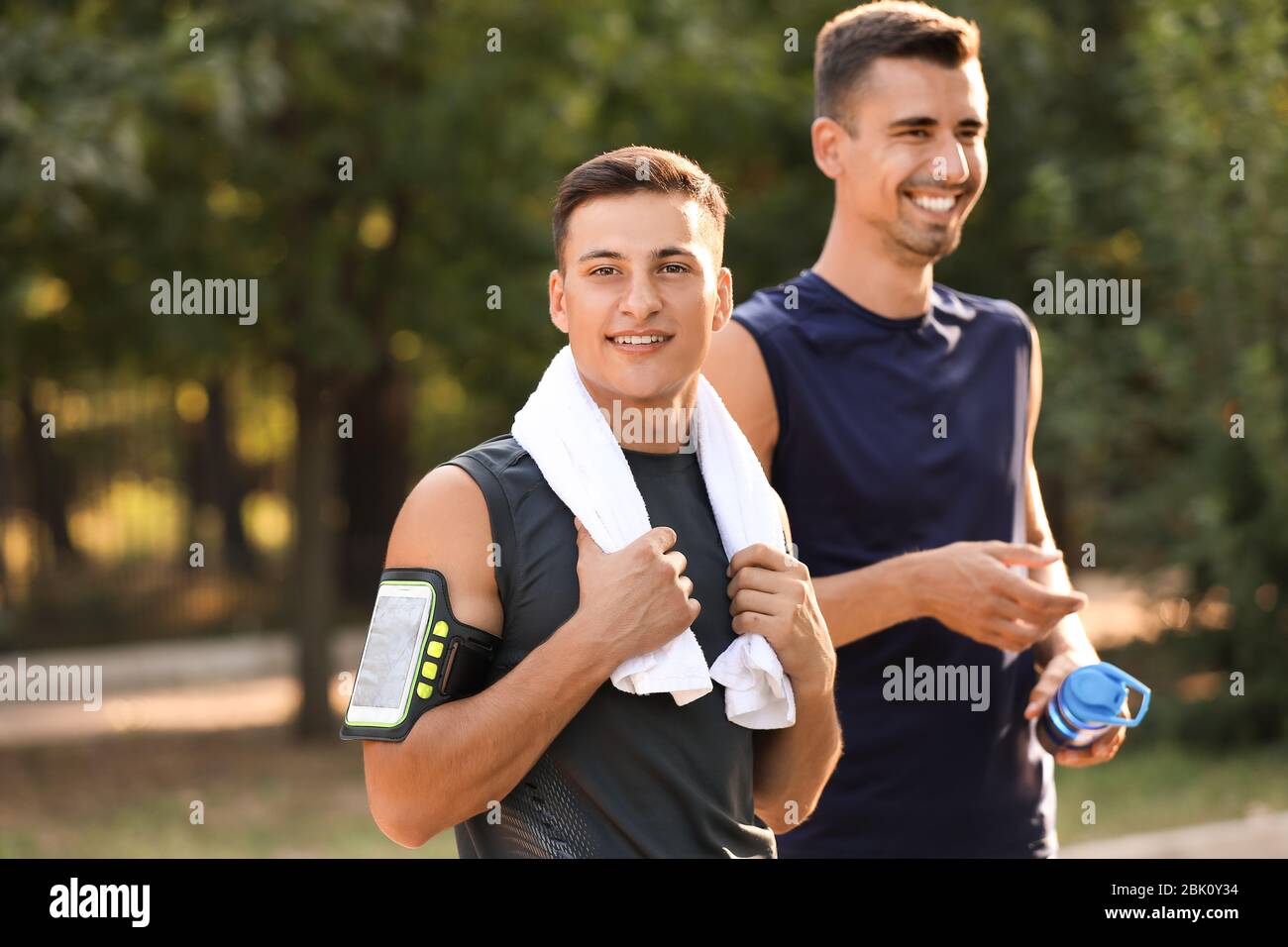 Sporty young people after training outdoors Stock Photo - Alamy