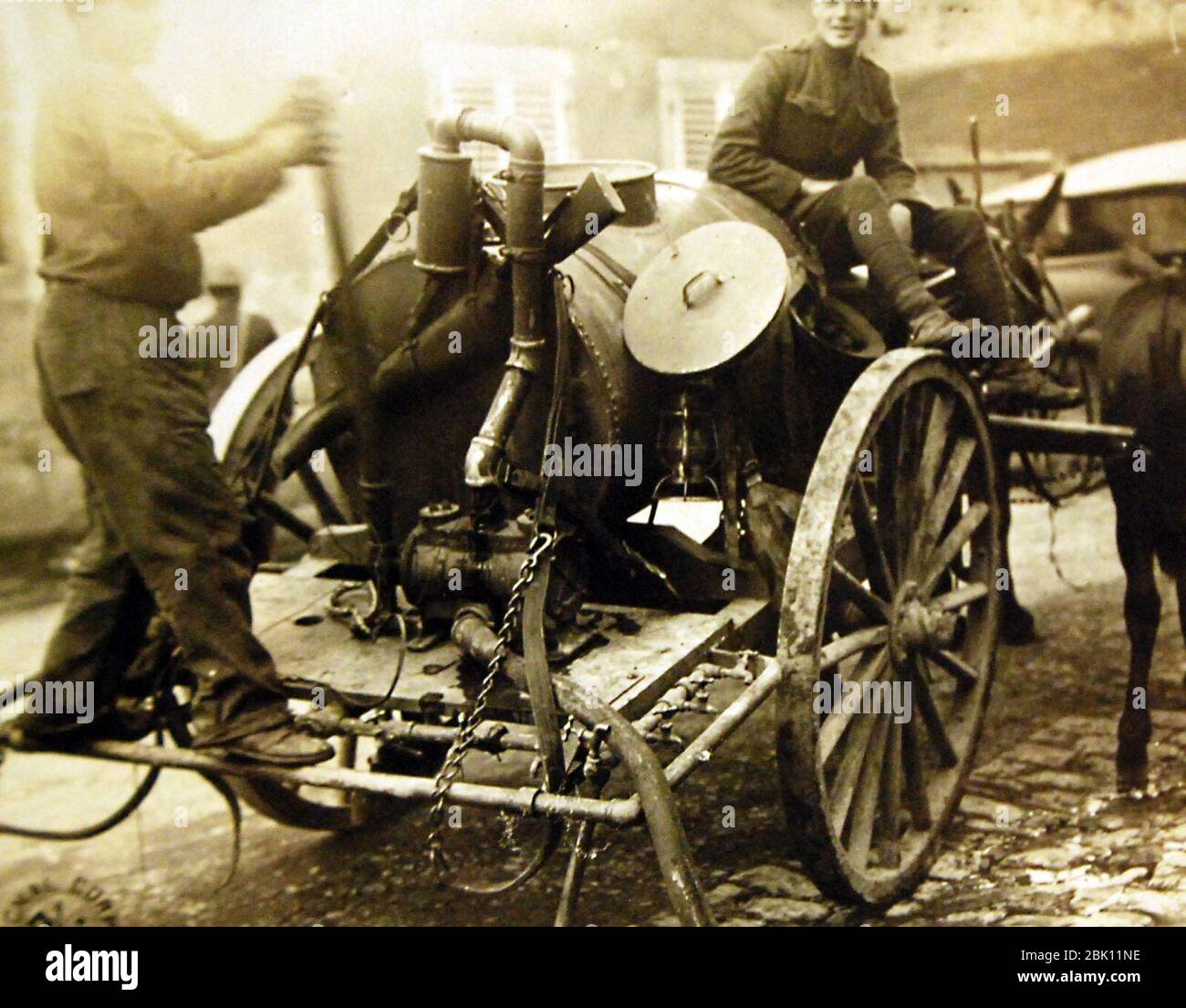 Horse-drawn water tank being filled in France during WWI (30661194072 ...