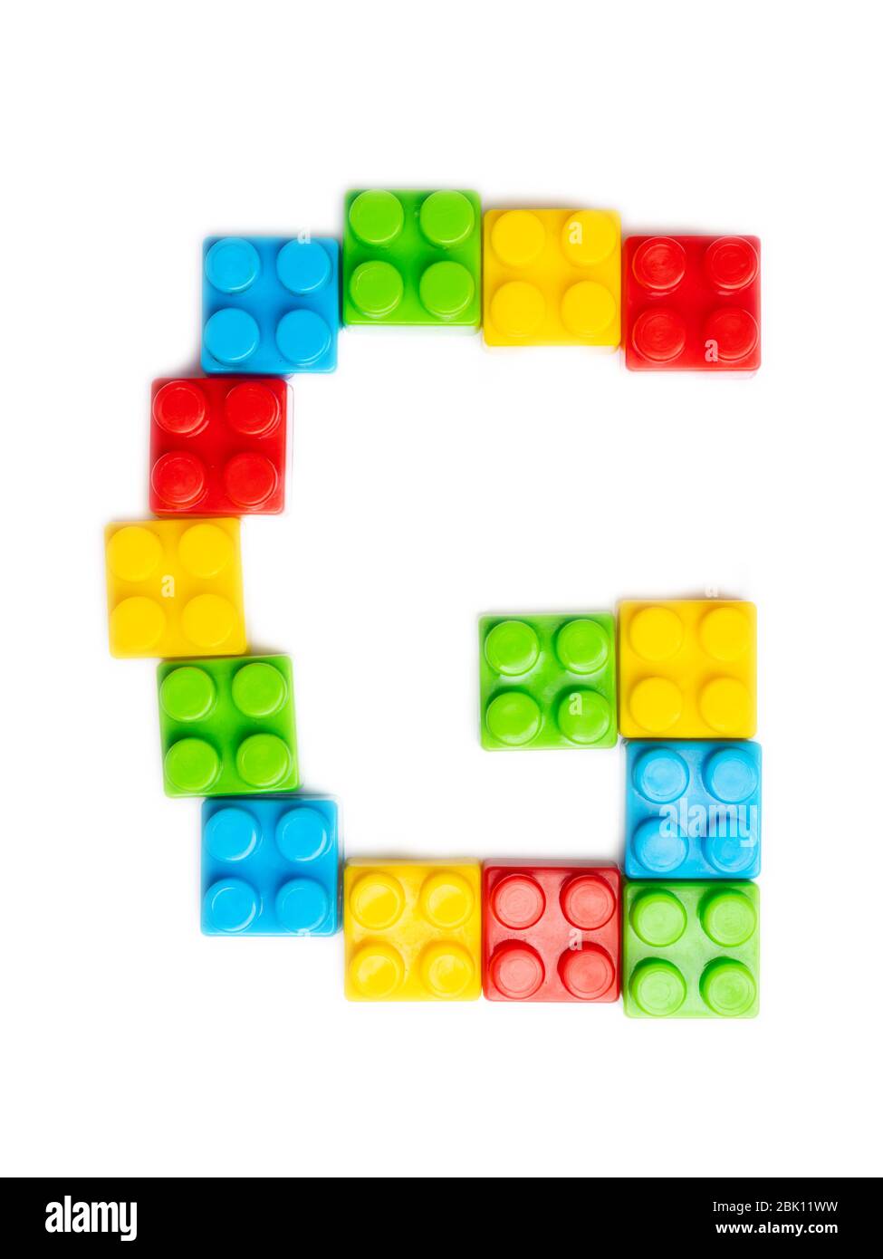 Letter G of the English alphabet from multi-colored children's plastic constructor on a white ...