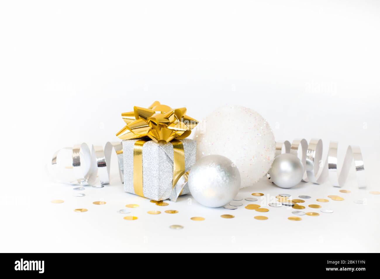 Christmas banner. Xmas silver gifts box with gold bows, white ...