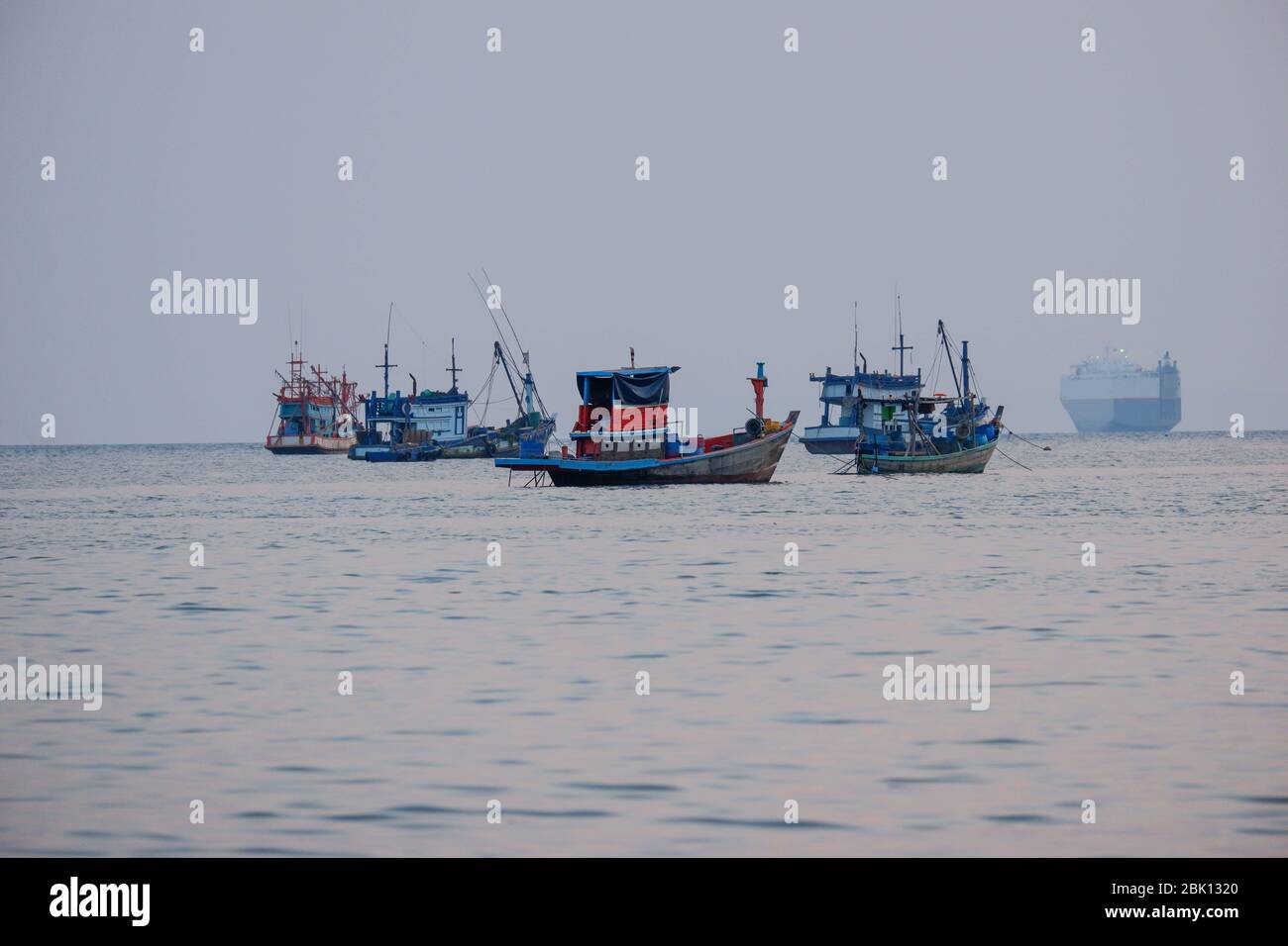 Many fishing boats Going to fish Stock Photo - Alamy