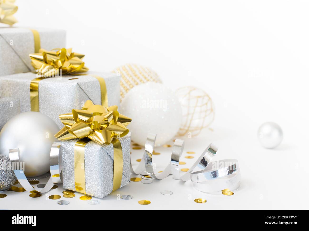 Christmas banner. Xmas silver gifts box with gold bows, white ...