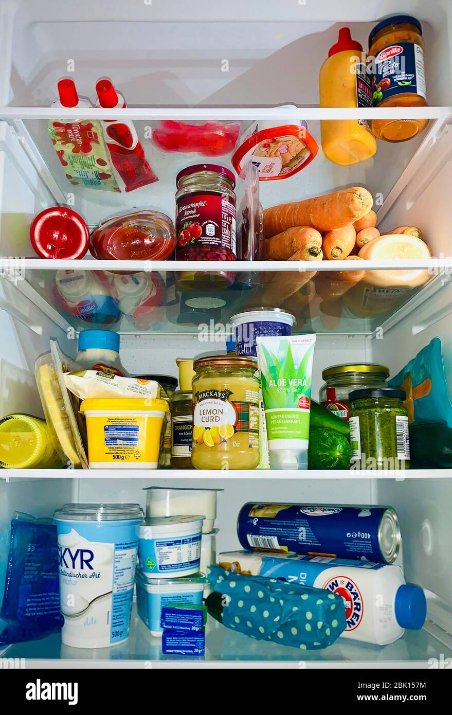 Different food in full refrigerator, interior view, Germany Stock Photo ...