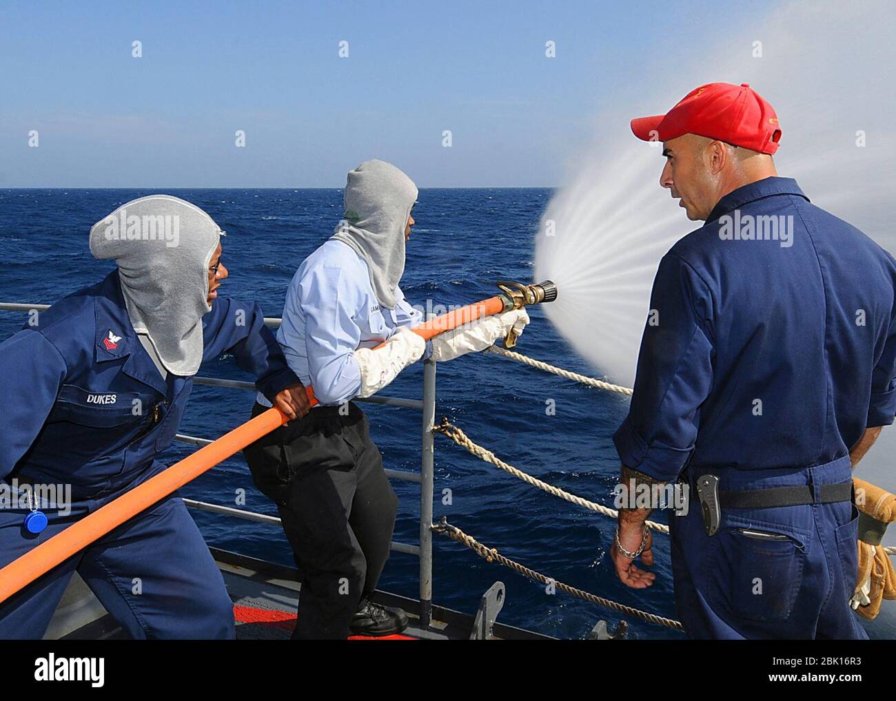 Hose team training aboard USS Vella Gulf Stock Photo - Alamy