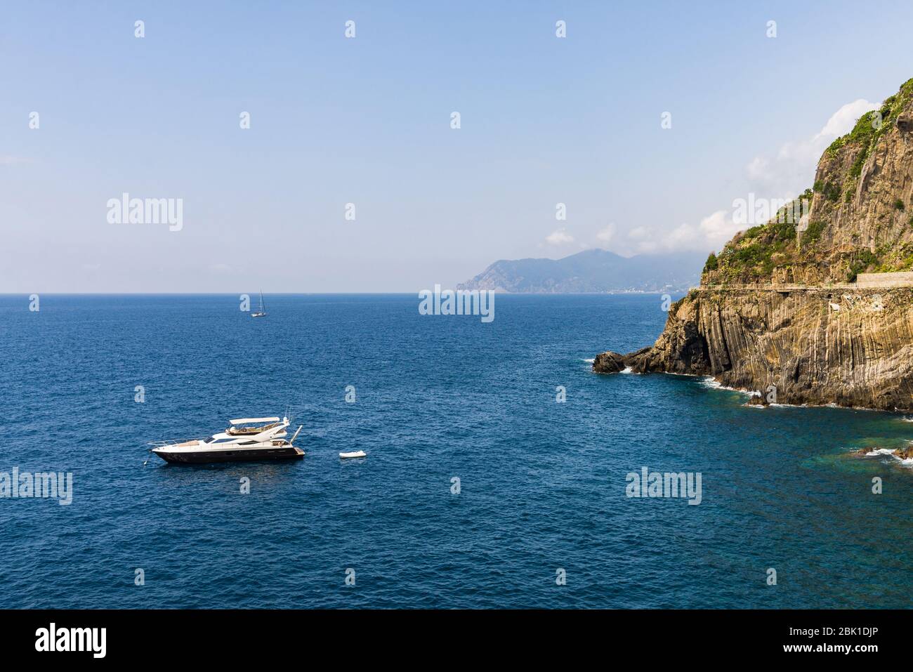 Ligurian Sea coastline in Liguria, Italy, with aquamarine water and ...
