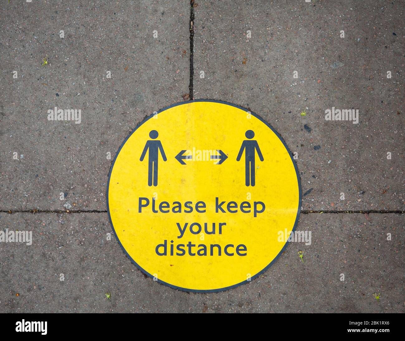 Social distancing street sign during covid-19 Stock Photo - Alamy