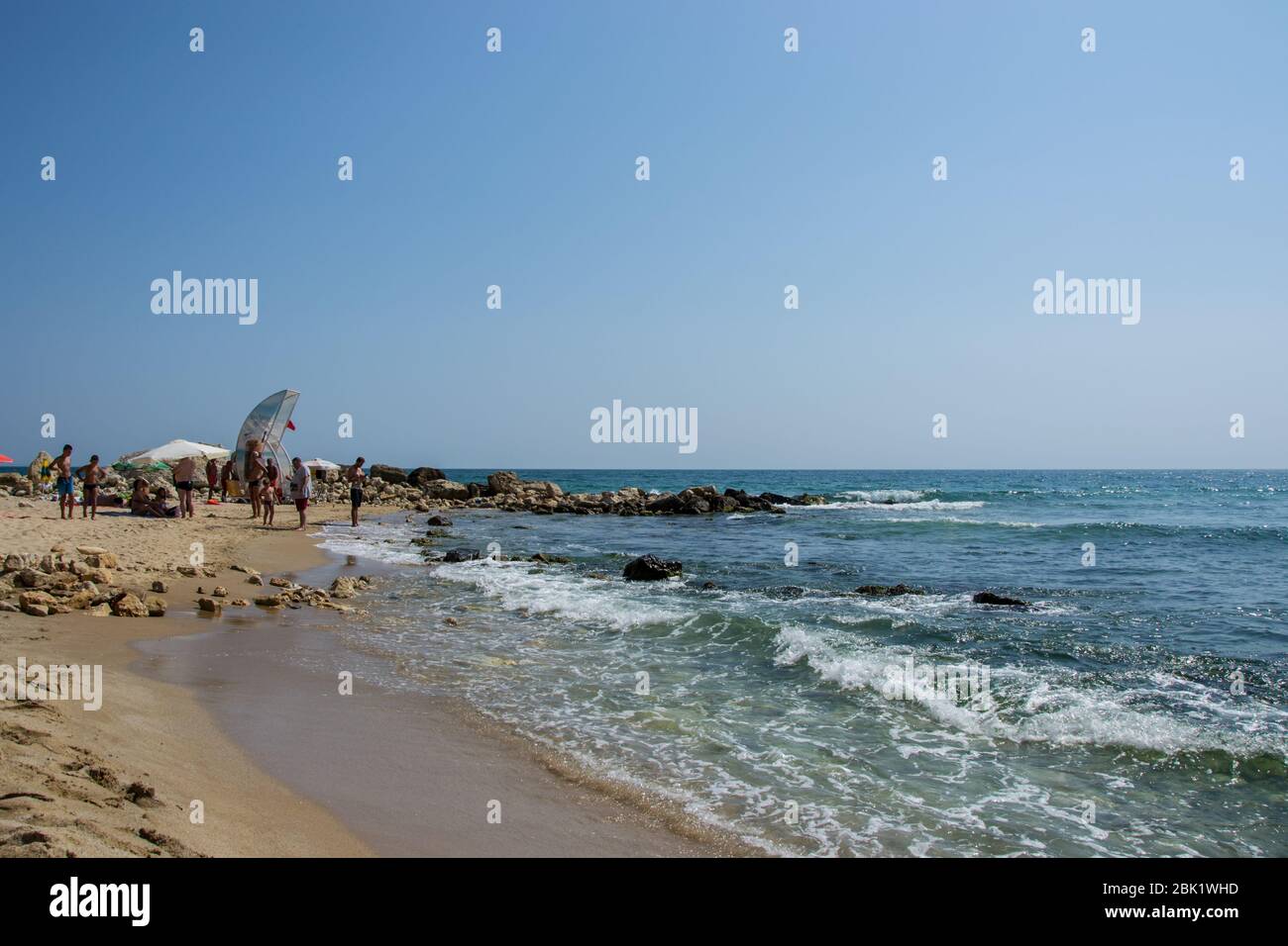 People enjoying the hot weather, beach fun - human in the water ...