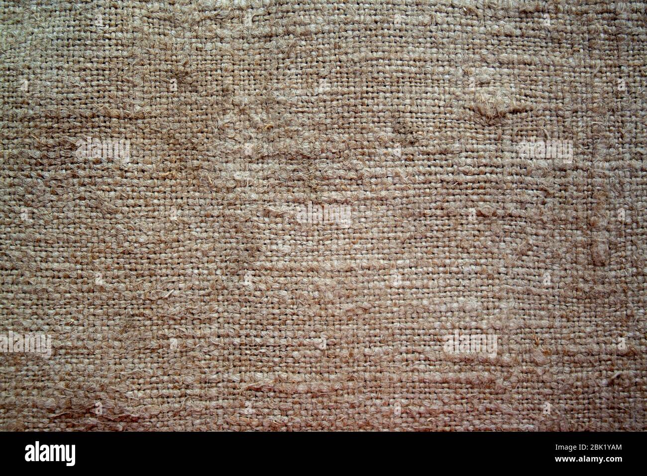 Aged vintage and weathered cloth background texture. Old damaged brown ...