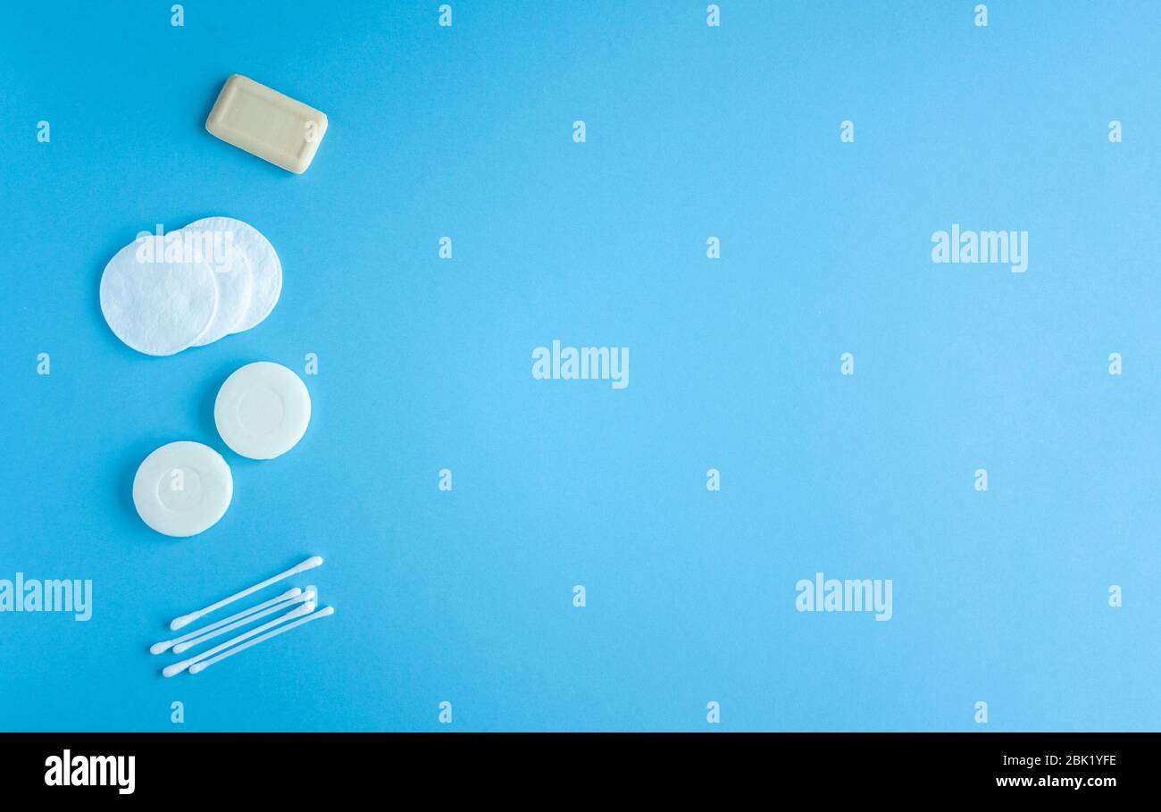 Composition of soap, cotton swabs and cotton pads top view. Self ...