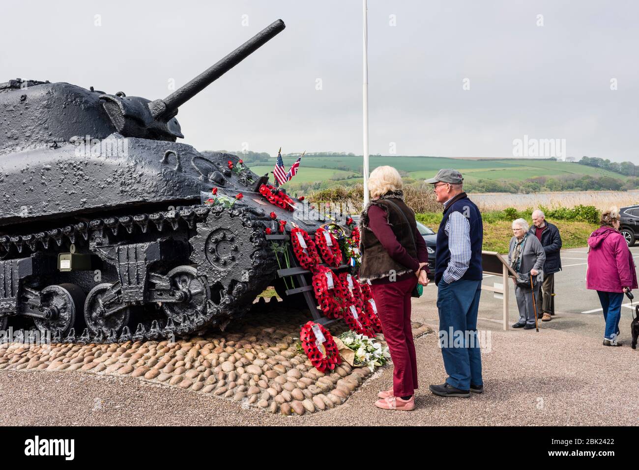 People visiting Torcross Sherman D Day Tank memorial, Slapton Sands ...