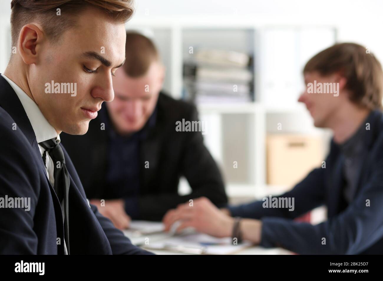 Group of people deliberate on problem Stock Photo - Alamy
