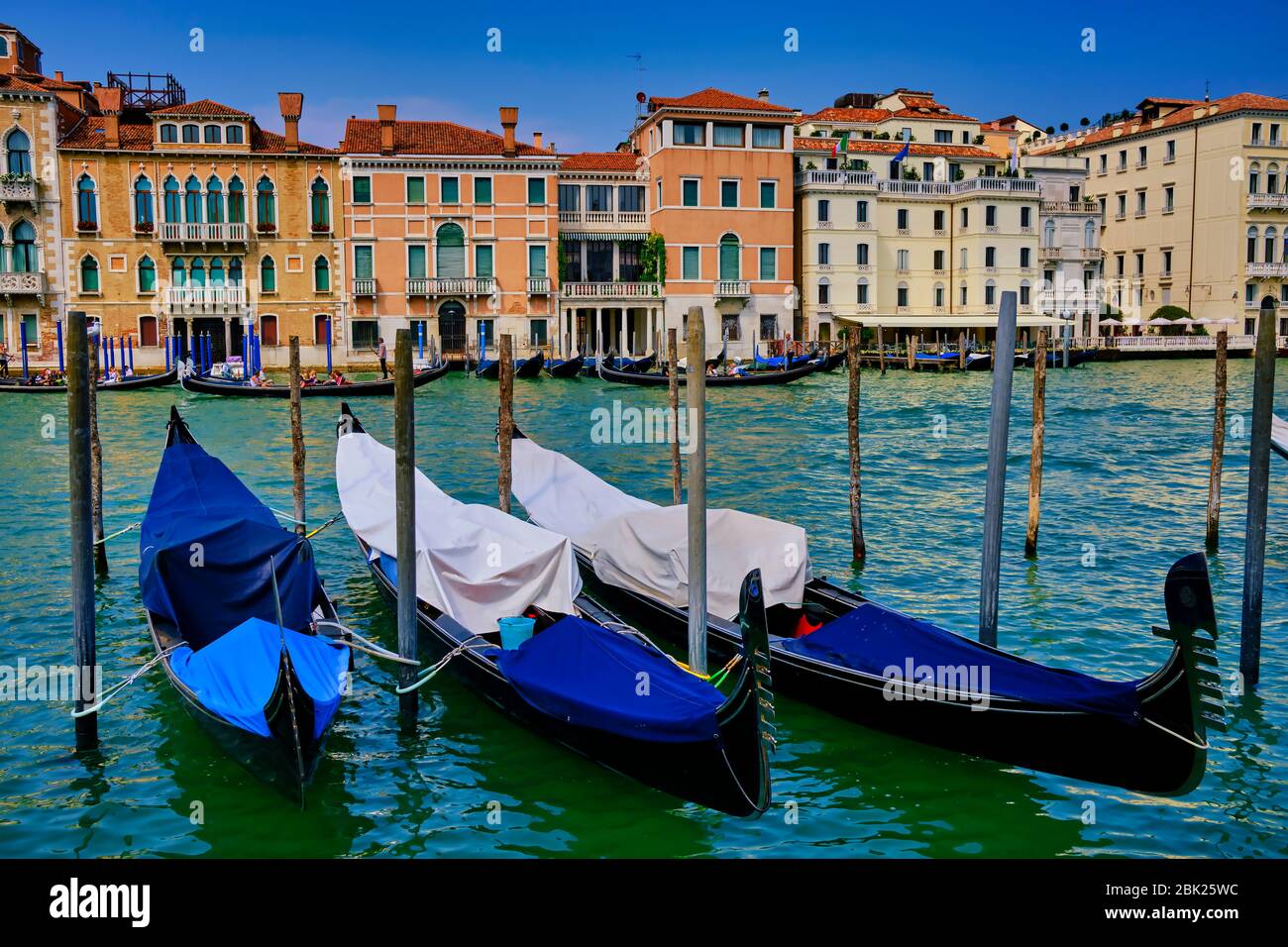 Three blue gondolas in grand canal in Venice Stock Photo - Alamy